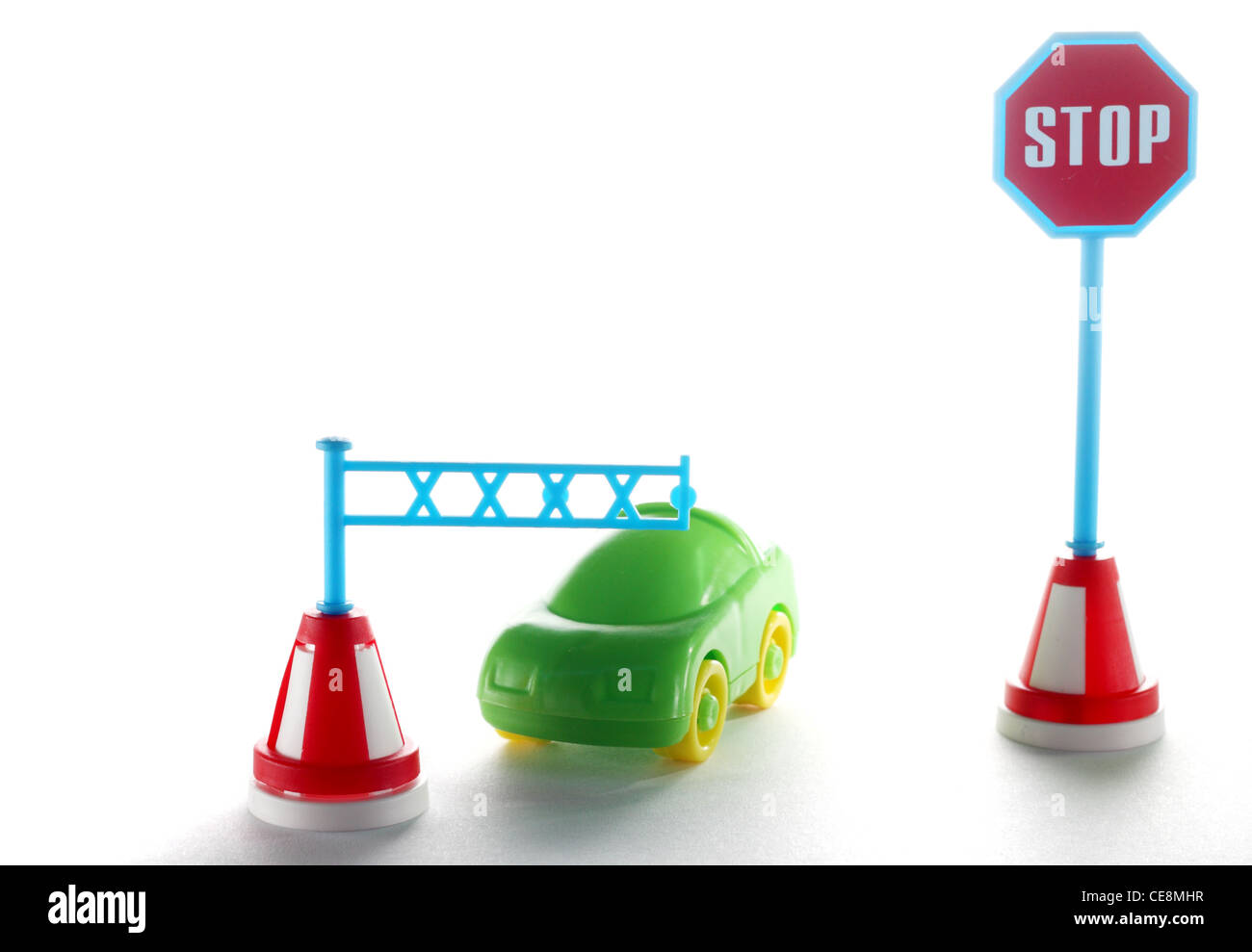 Car behind stop road sign with barrier on a white background Stock ...