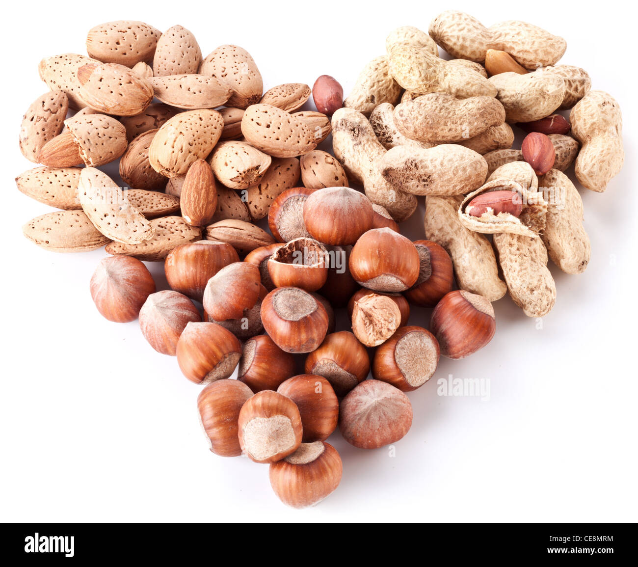Nuts in the shape of heart isolated on a white background Stock Photo ...