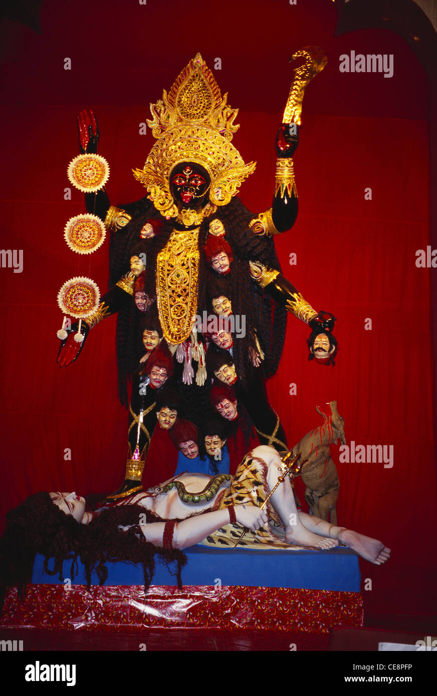 Idol of indian Goddess Kali with garland of skulls in Pooja puja ...