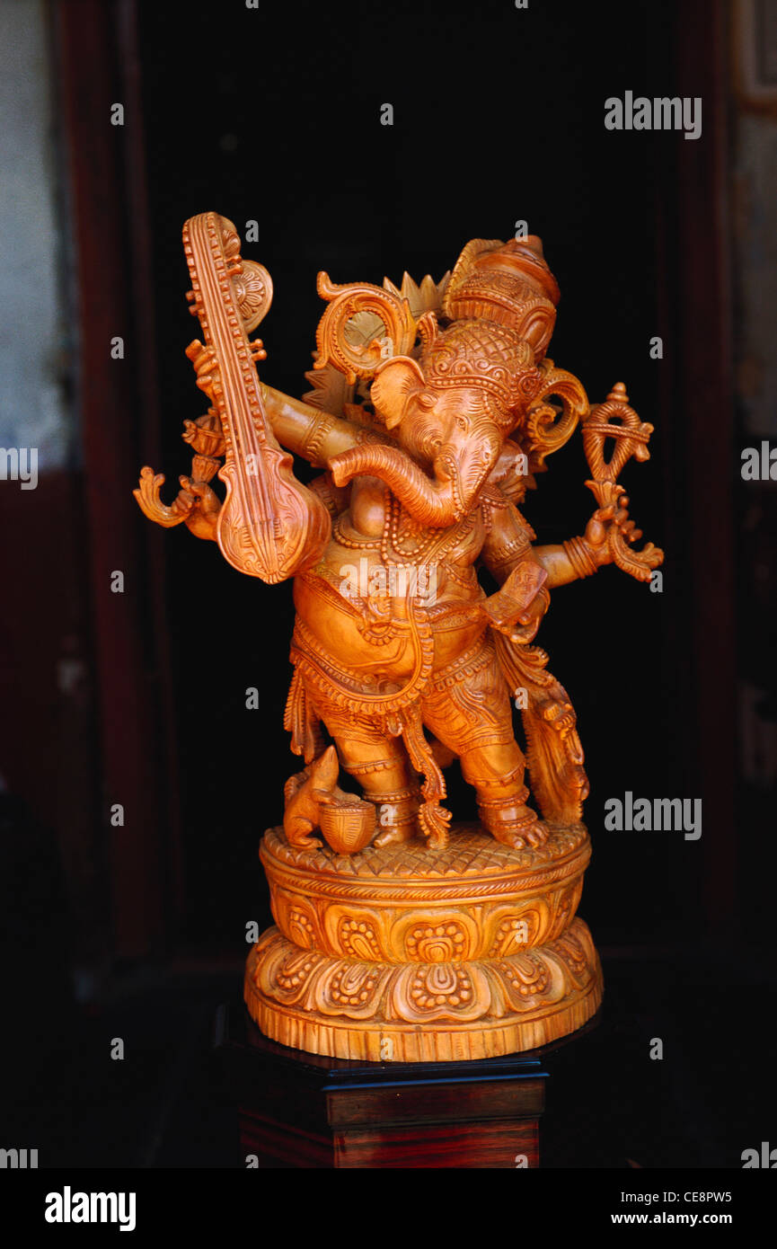 dancing Ganesh holding musical instrument veena ; sandalwood handicraft ...