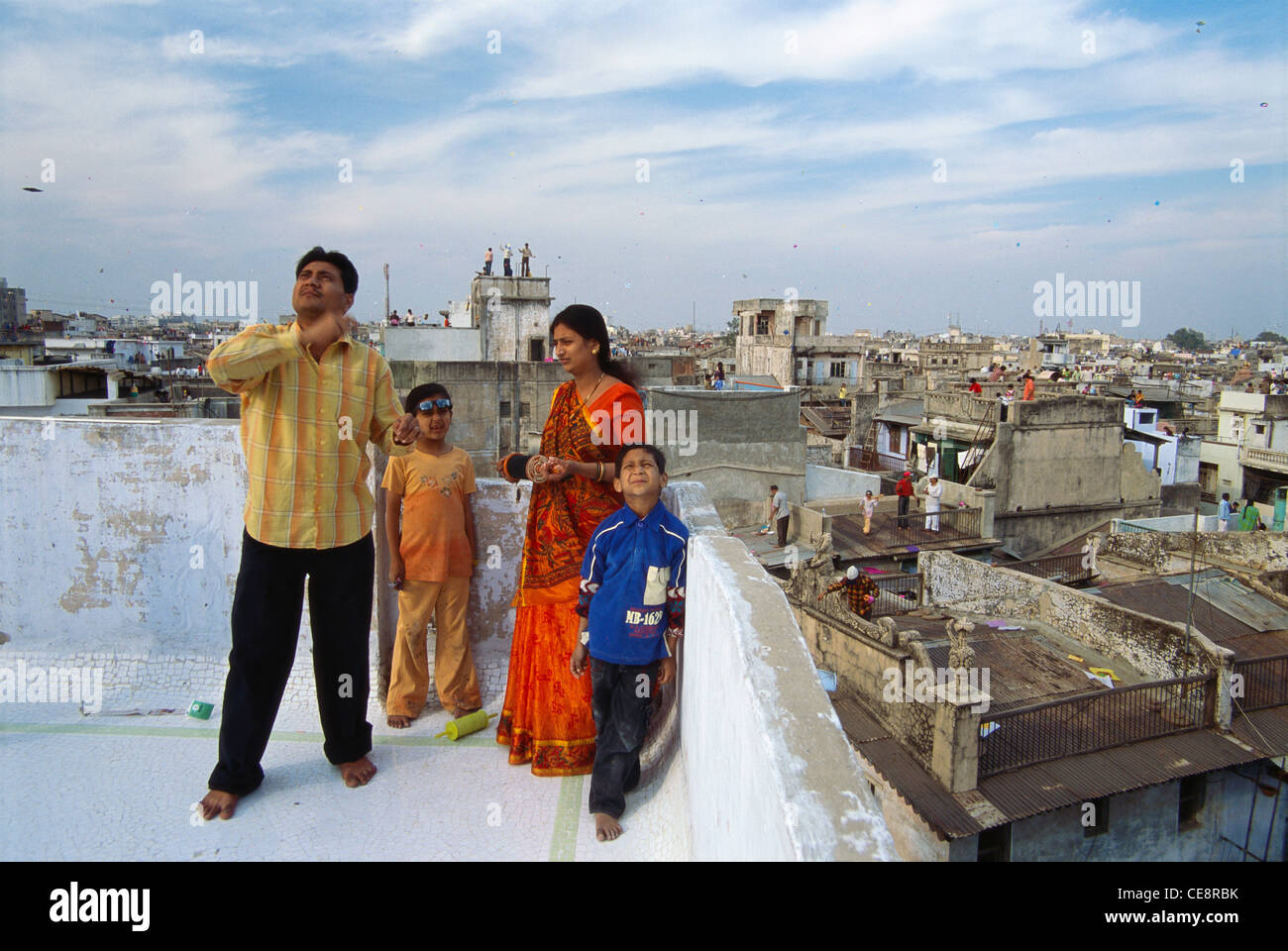 Indian family flying kite hi-res stock photography and images - Alamy