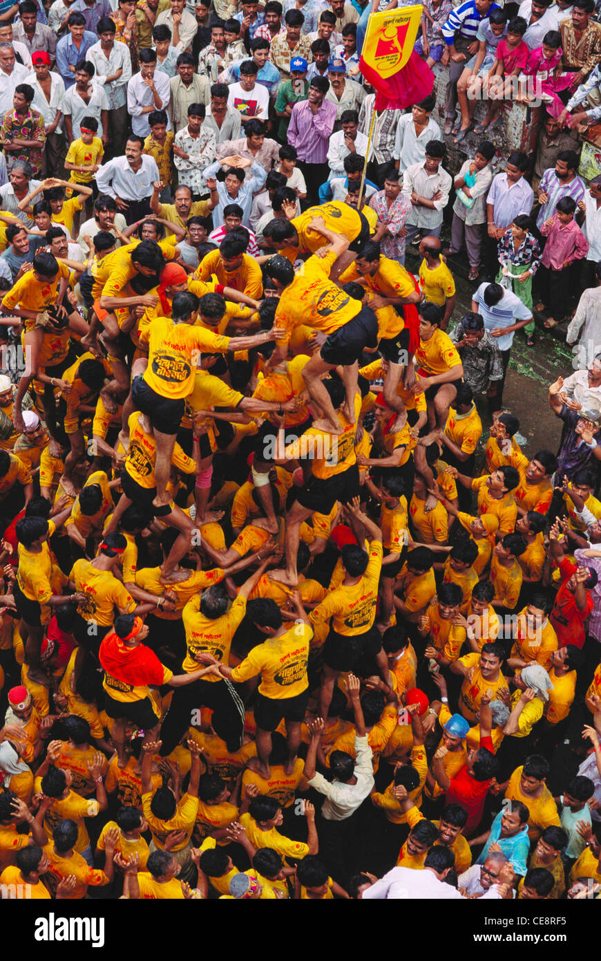Human pyramid in crowd on hi-res stock photography and images - Alamy