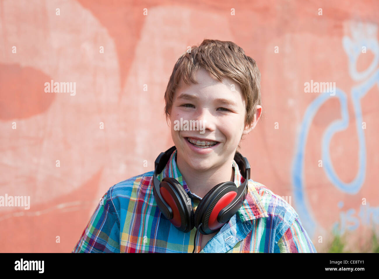 Smiling boy headphones, portrait Stock Photo - Alamy
