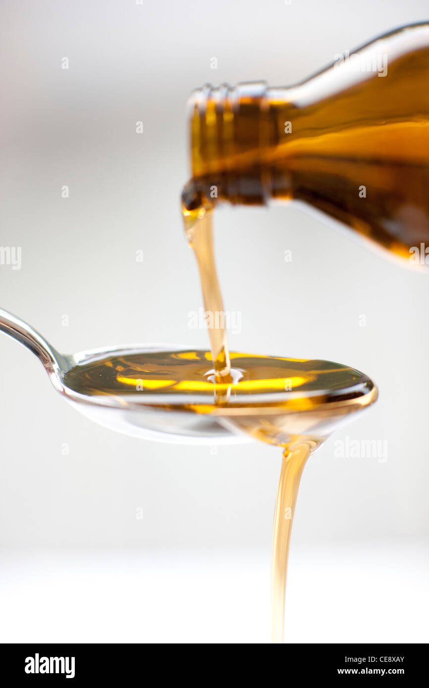 Liquid Pouring From Bottle Stock Photos & Liquid Pouring From Bottle ...