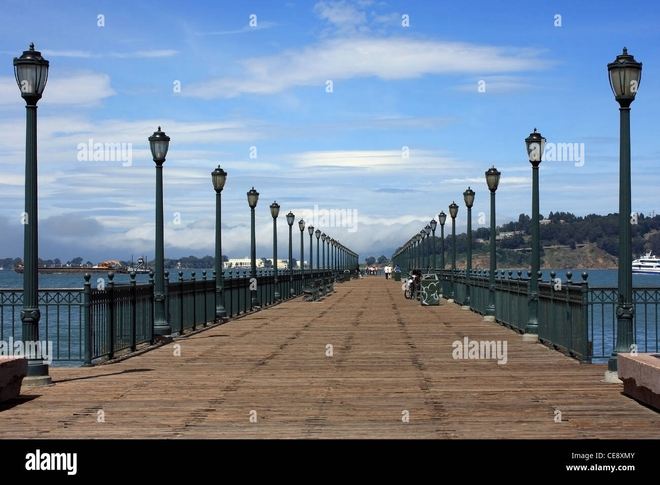 A wooden pier with lanterns Stock Photo - Alamy