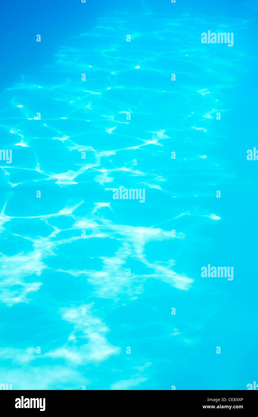 Light reflecting in swimming pool bottom Stock Photo - Alamy