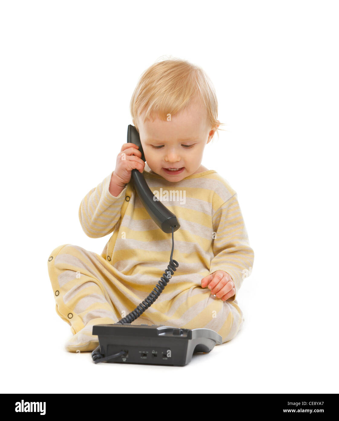 Adorable baby speaking on phone isolated on white Stock Photo - Alamy