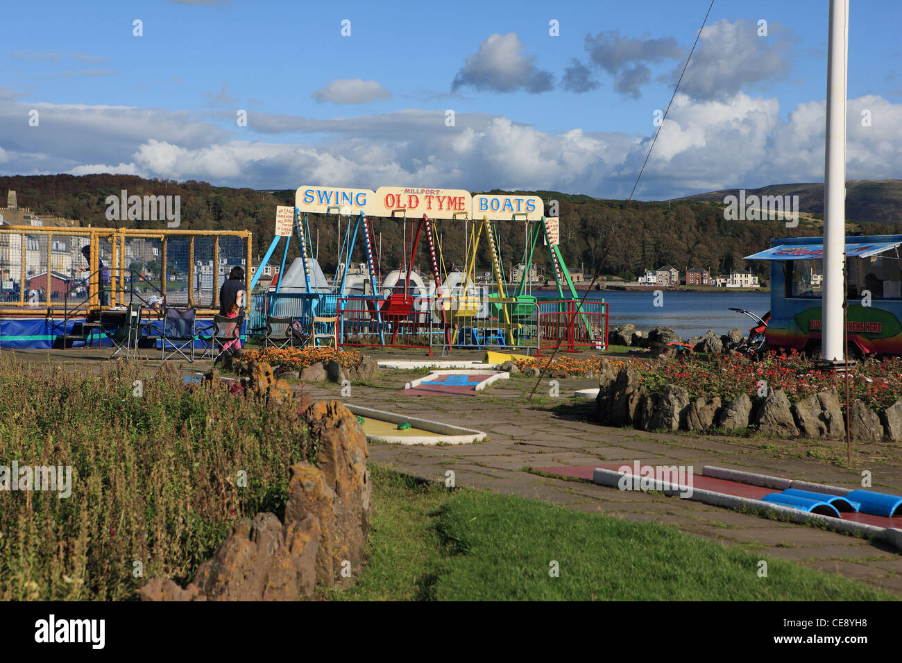 Crazy golf and funfair rides at the seaside in Millport on the Isle of ...