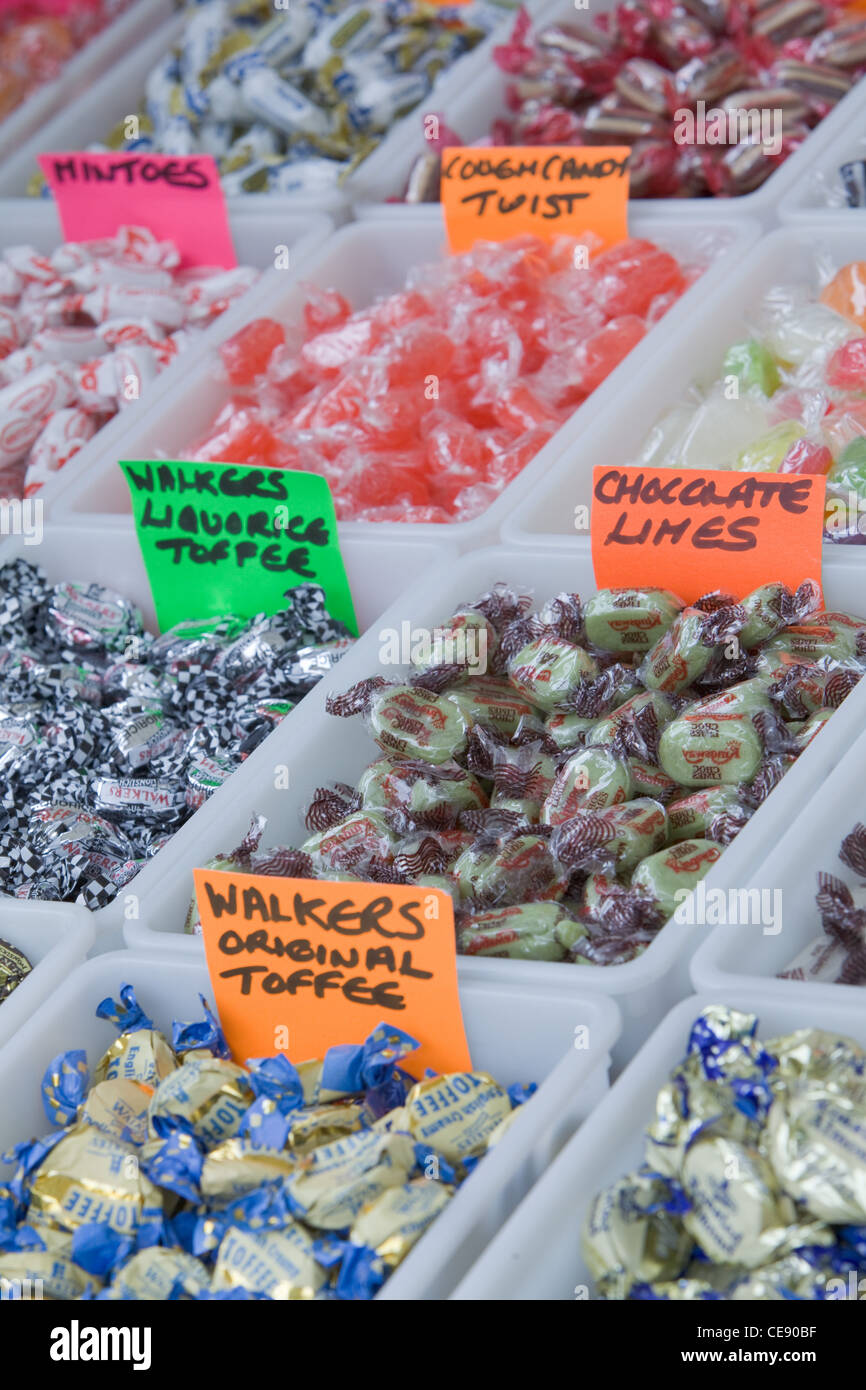Various sweets on display for sale on a market stall in England Stock ...