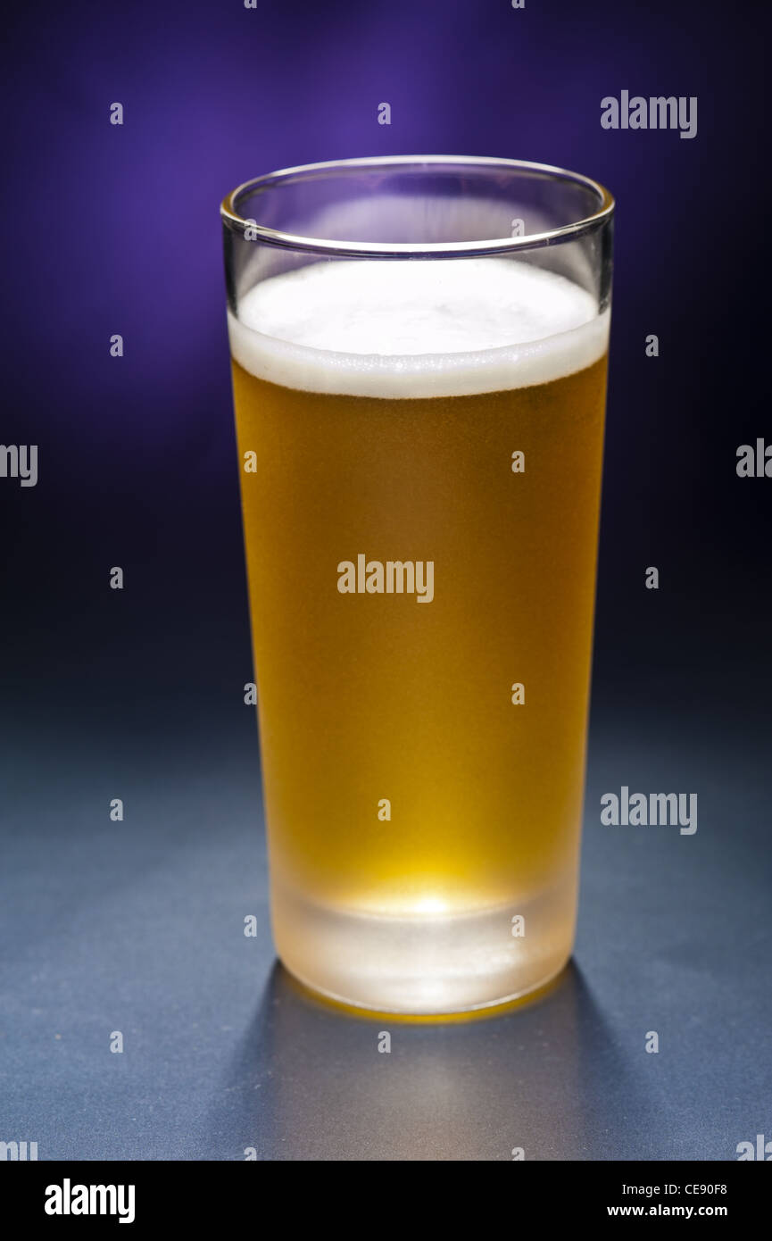 Bier glasses in front of a colorful background with little decoration ...