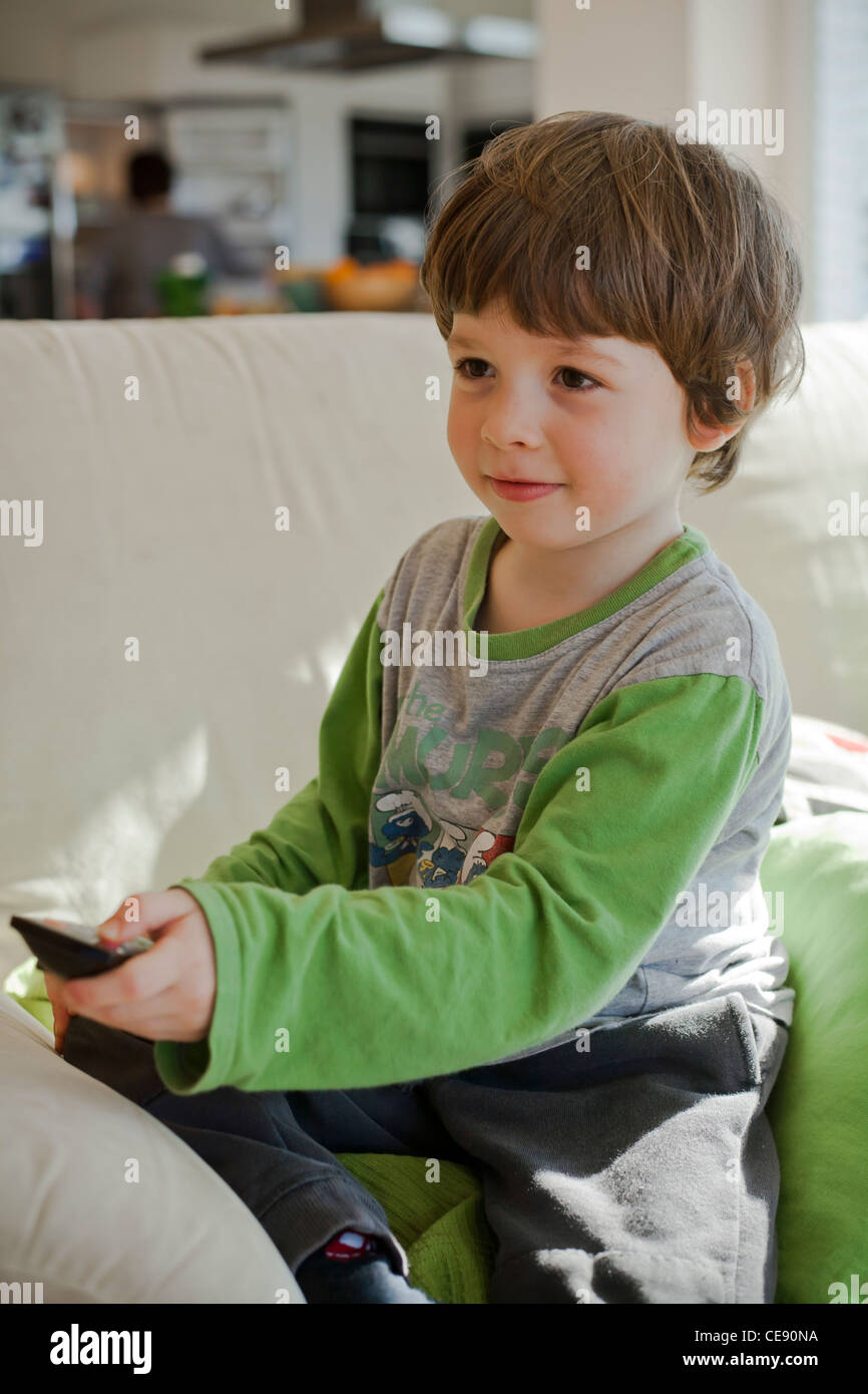 Boy with remote control Stock Photo - Alamy