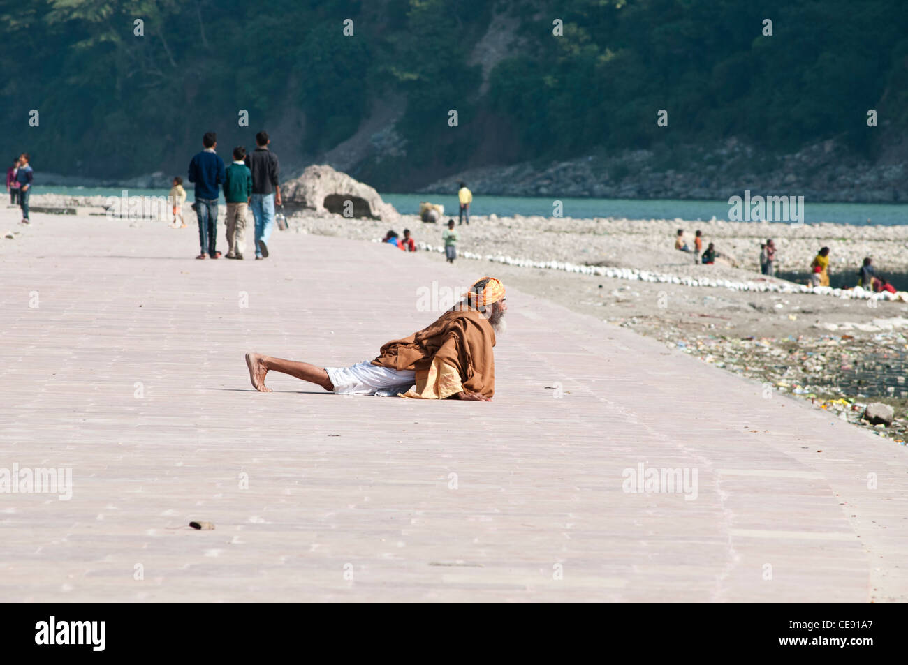 Sadhu prostrating himself on Triveni Ghat, Rishikesh, Uttarakhand ...