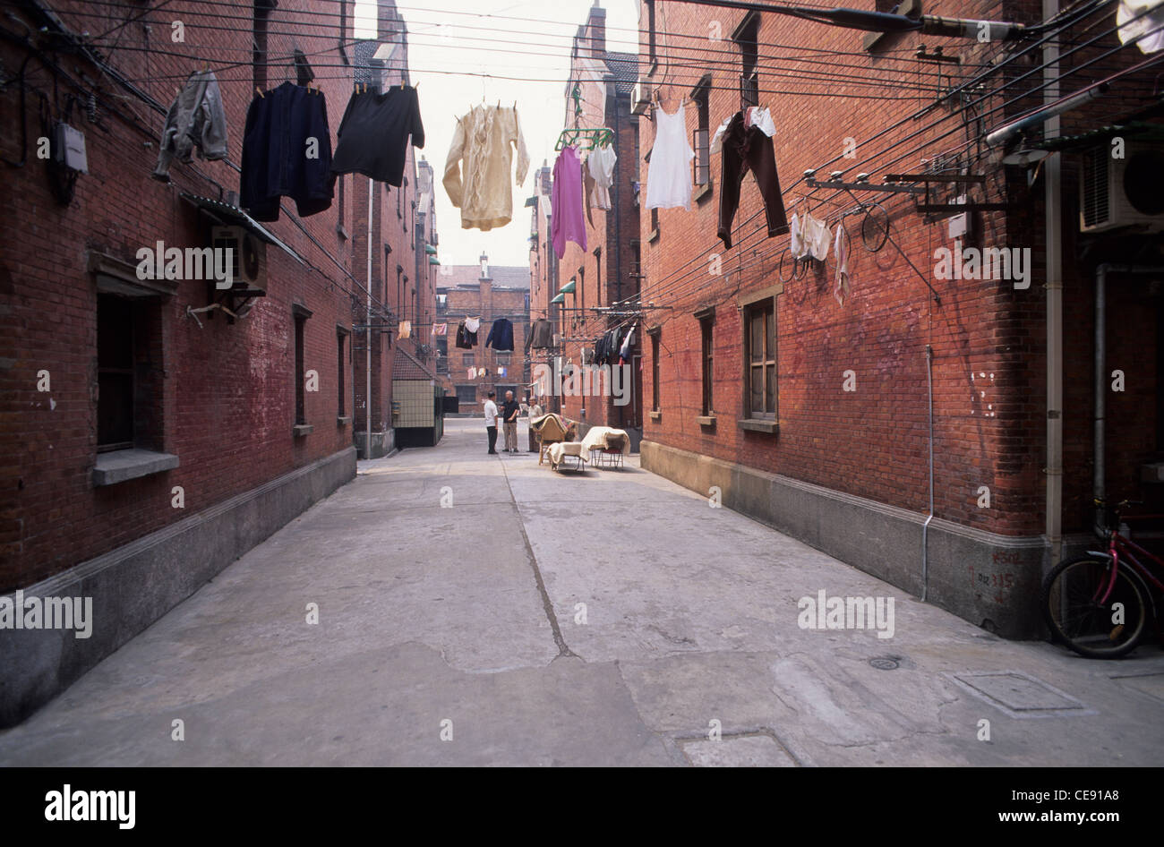 China, Shanghai, backstreets in the Jing Ansi area showing red brick ...
