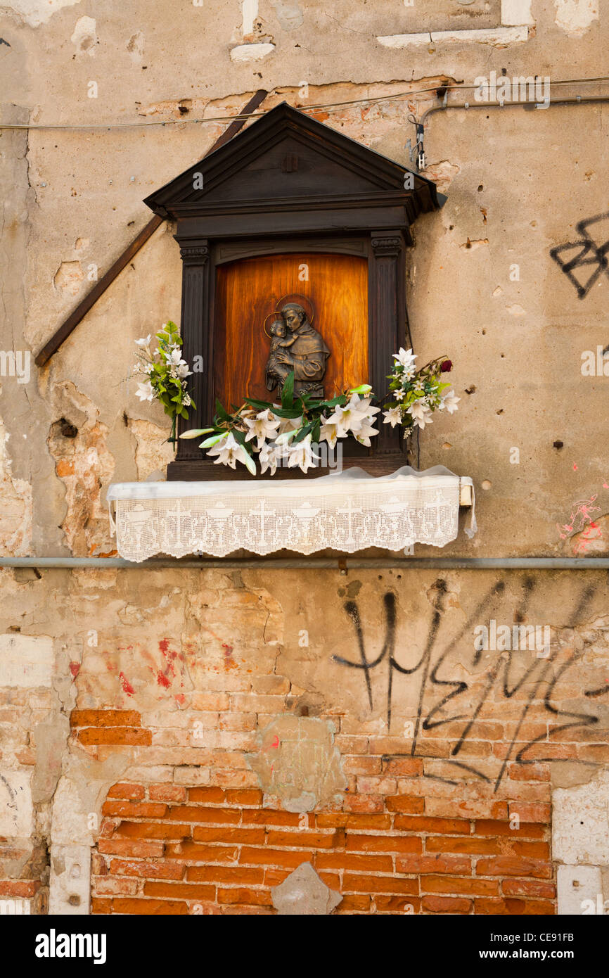 Wall shrine in the romantic city of Venice, Italy Stock Photo - Alamy