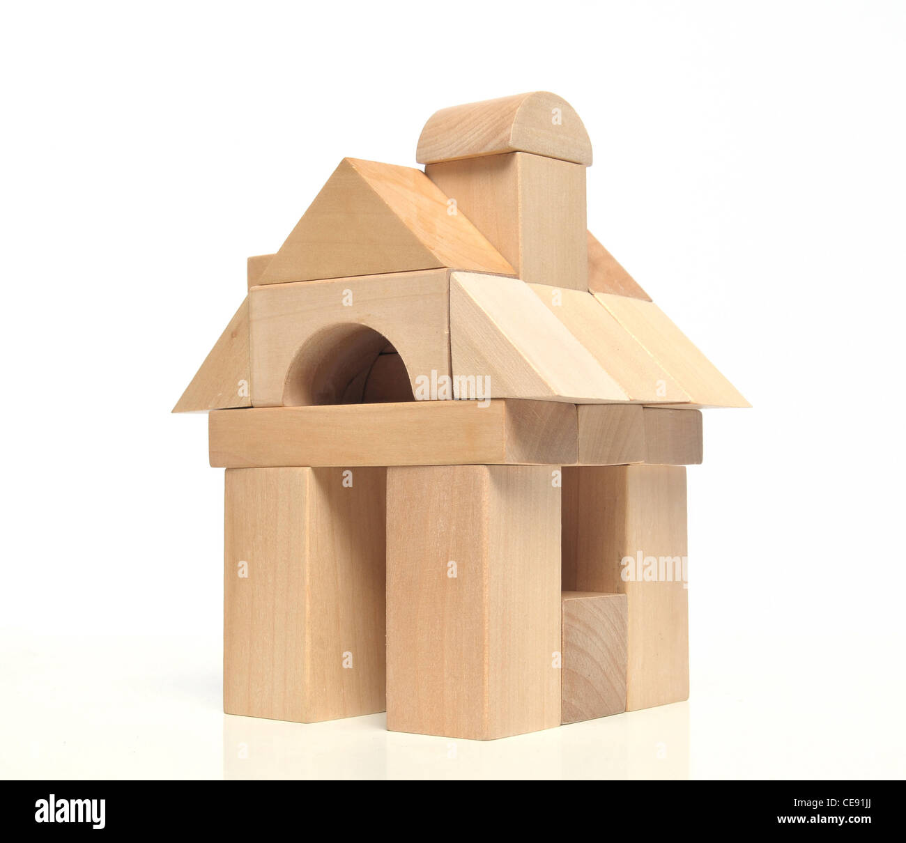 House of natural colored toy blocks on white background Stock Photo - Alamy