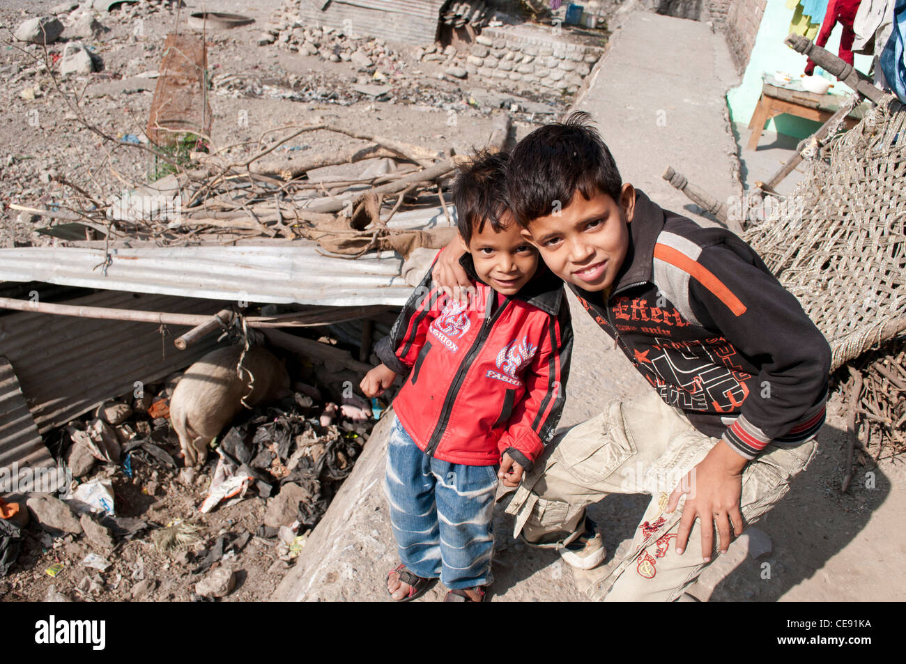 Two boys slum rishikesh uttarakhand hi-res stock photography and images ...