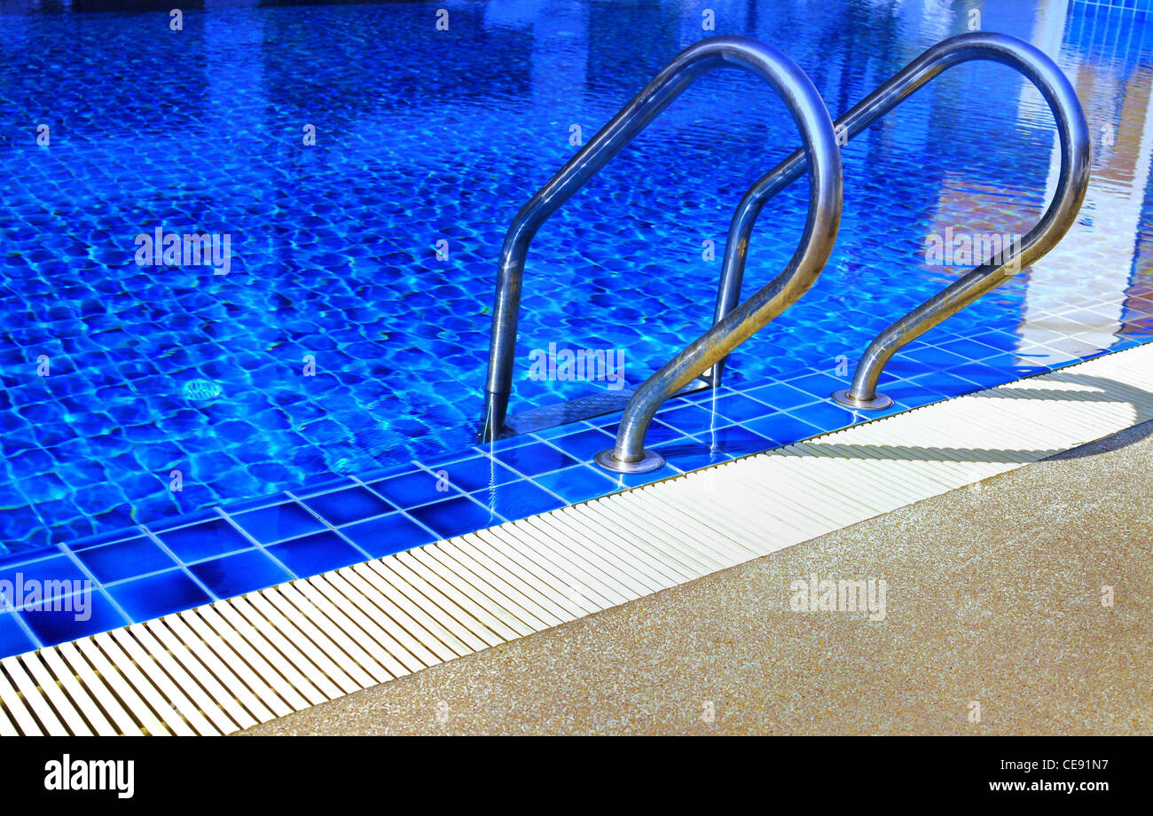 Swimming pool with clear blue water Stock Photo - Alamy