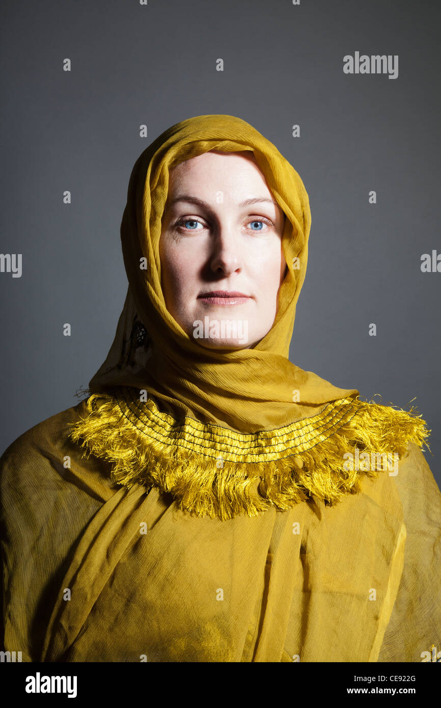 Woman wearing Yellow Shawl Stock Photo - Alamy