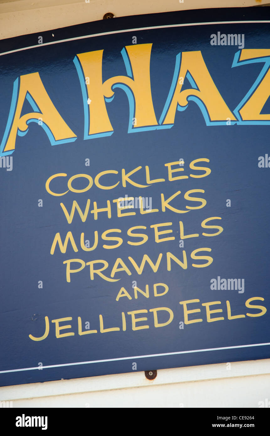 Cockles whelks mussles prawns and jellied eels signwritten on a shop ...