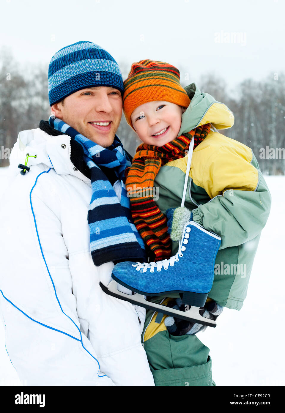 father and son going ice skating Stock Photo - Alamy