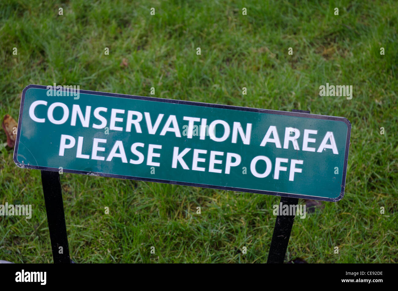 A conservation area - Keep Off metal sign on a lawn Stock Photo - Alamy