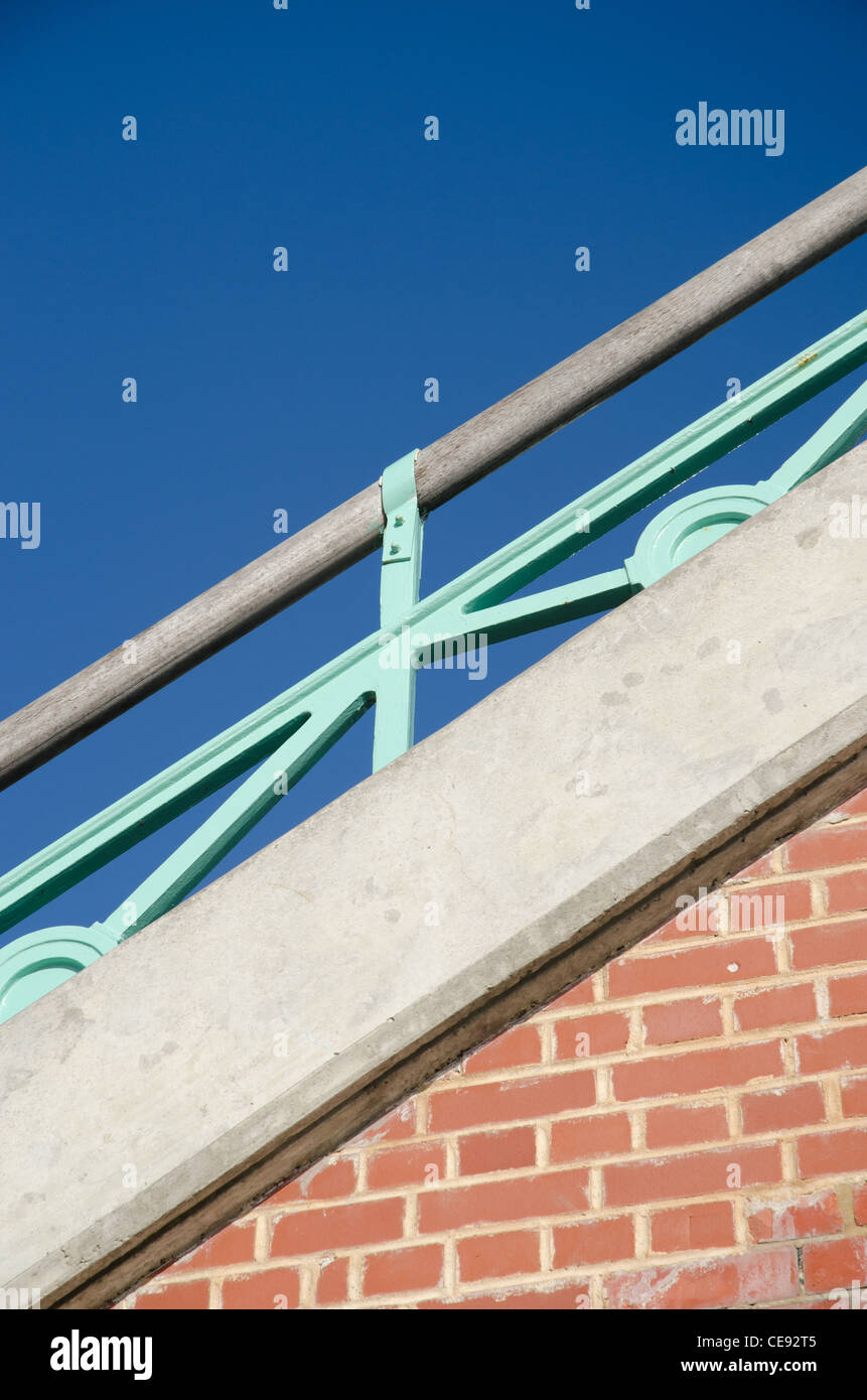 Blue sky metal railings green wrought iron handrail red brickwork ...