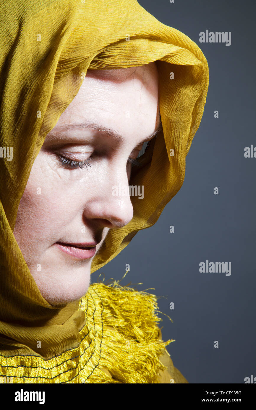 Woman wearing Yellow Shawl portrait Stock Photo - Alamy