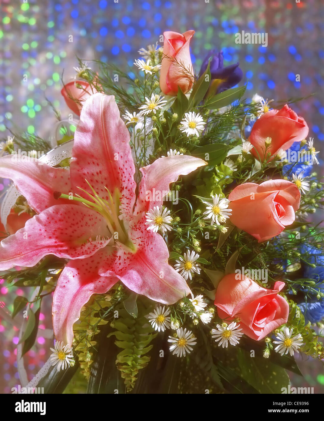 lily and red roses bunch Stock Photo - Alamy