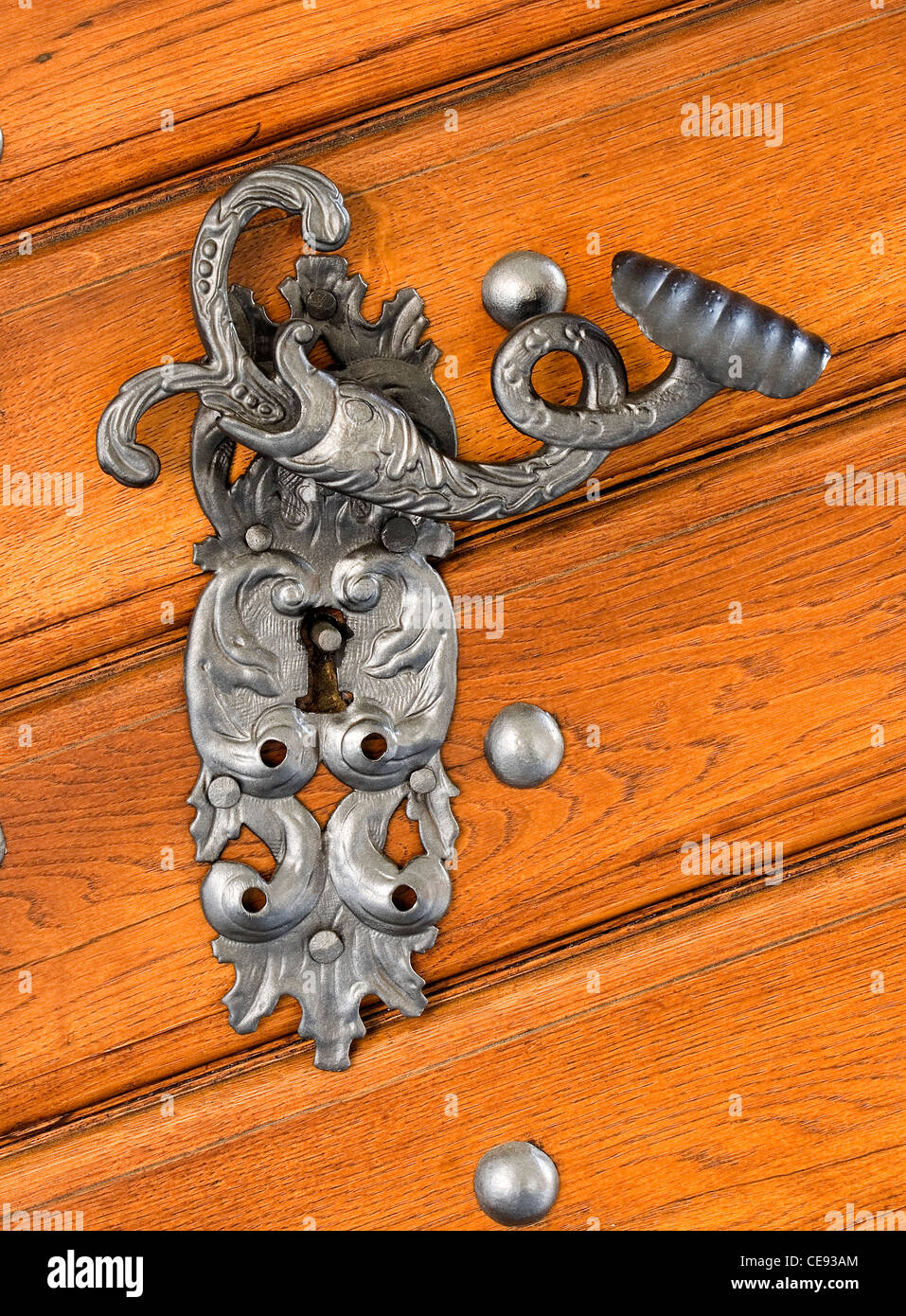 antique beaten door handle Stock Photo - Alamy