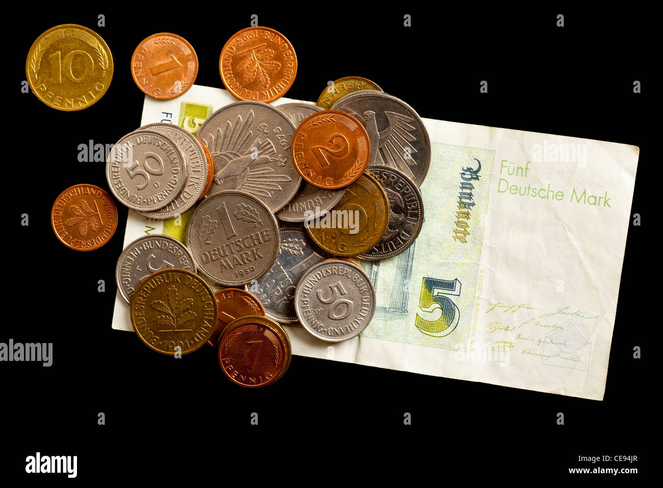 D-Mark currency (coins and banknote) isolated on black background Stock ...