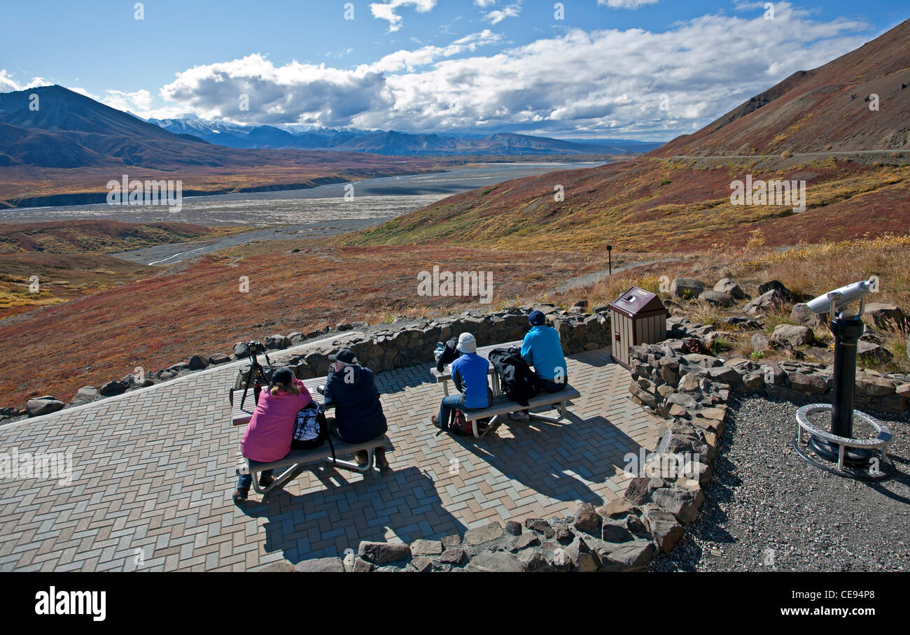 Tourists contemplating the landscape. Eielson Visitor Center. Denali ...
