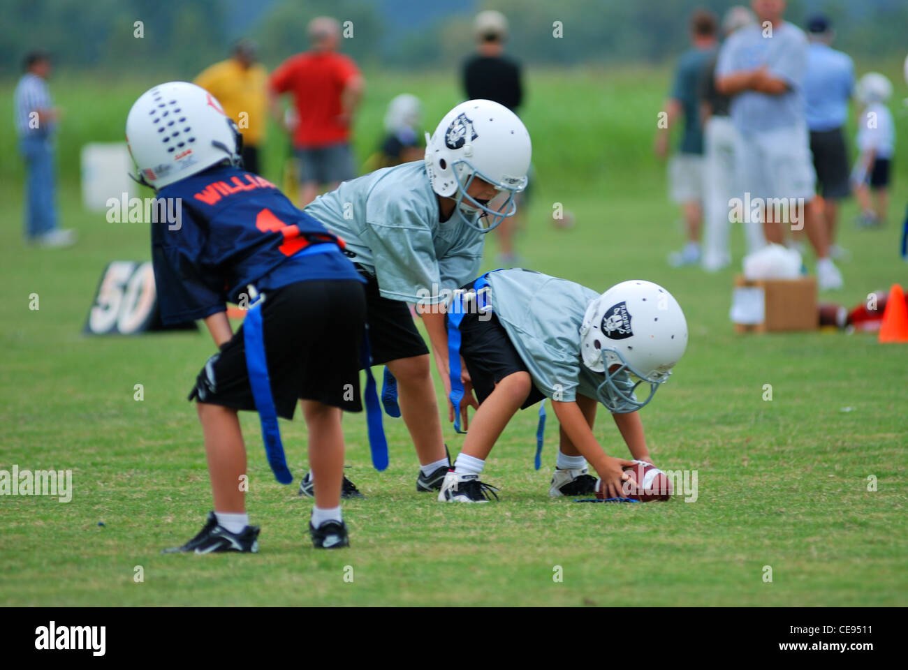Photograph of pee wee American football players Stock Photo - Alamy