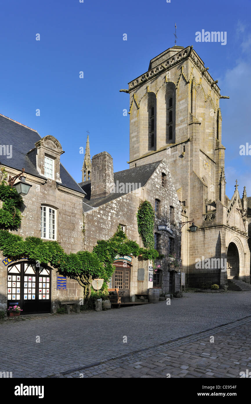 Old picturesque houses and the Saint Ronan church at Locronan ...