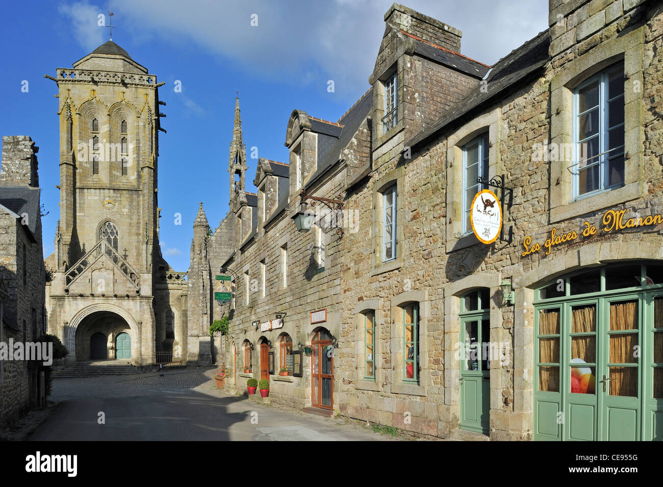 Old picturesque houses and the Saint Ronan church at Locronan ...