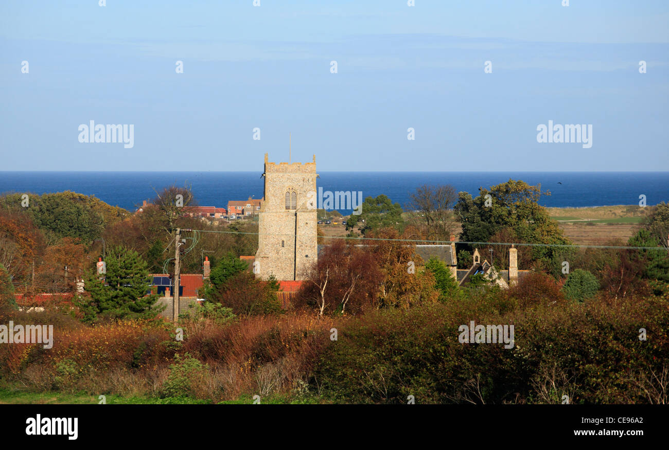Brancaster church and village with the sea behind Stock Photo - Alamy