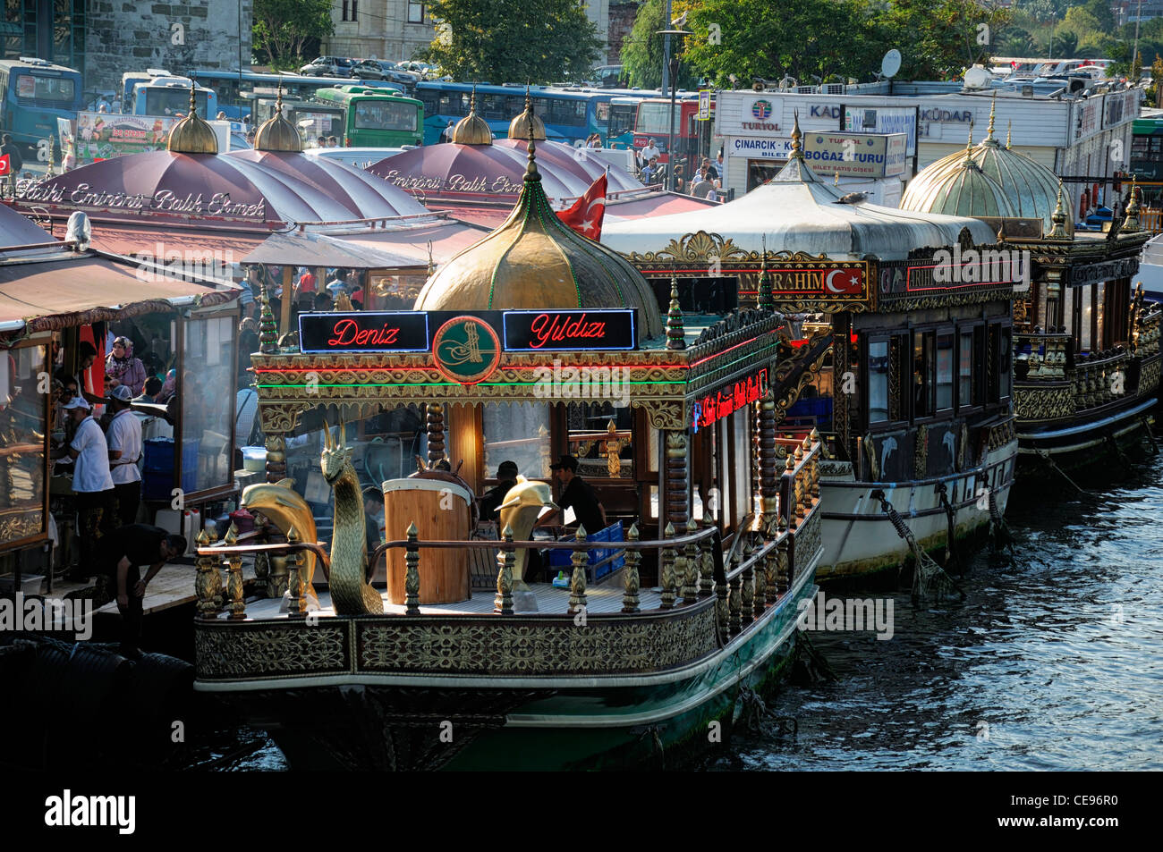 Boats sell selling Balik Ekmek fish mackerel bread sandwich Galata ...