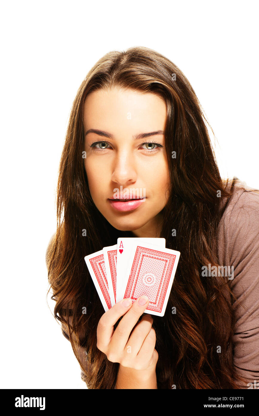 tense looking woman playing poker on white background Stock Photo - Alamy