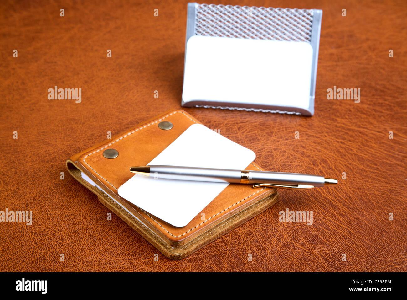 Organizer support for papers and pen on a textural background Stock ...
