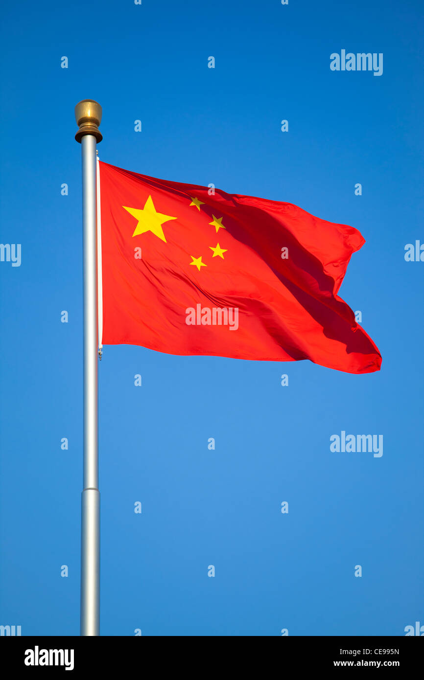 The Chinese Flag blowing in the wind in Tiananmen Square, Beijing Stock ...