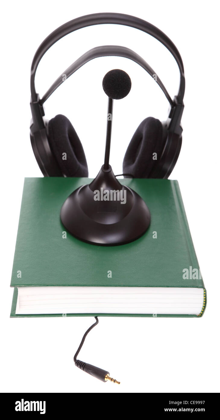 Books stack and headset with a microphone isolated on white Stock Photo ...