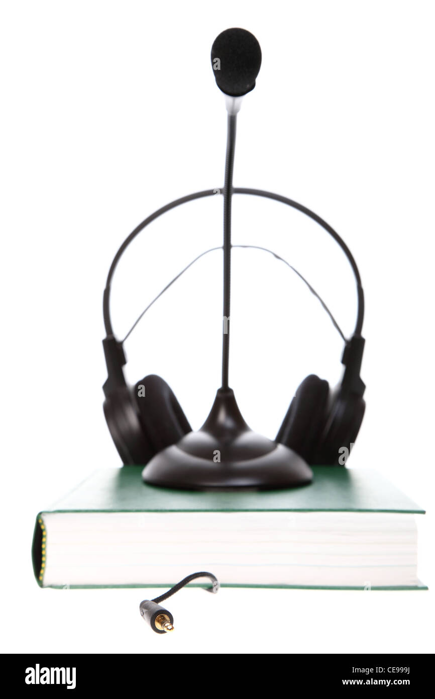 Books stack and headset with a microphone isolated on white Stock Photo ...