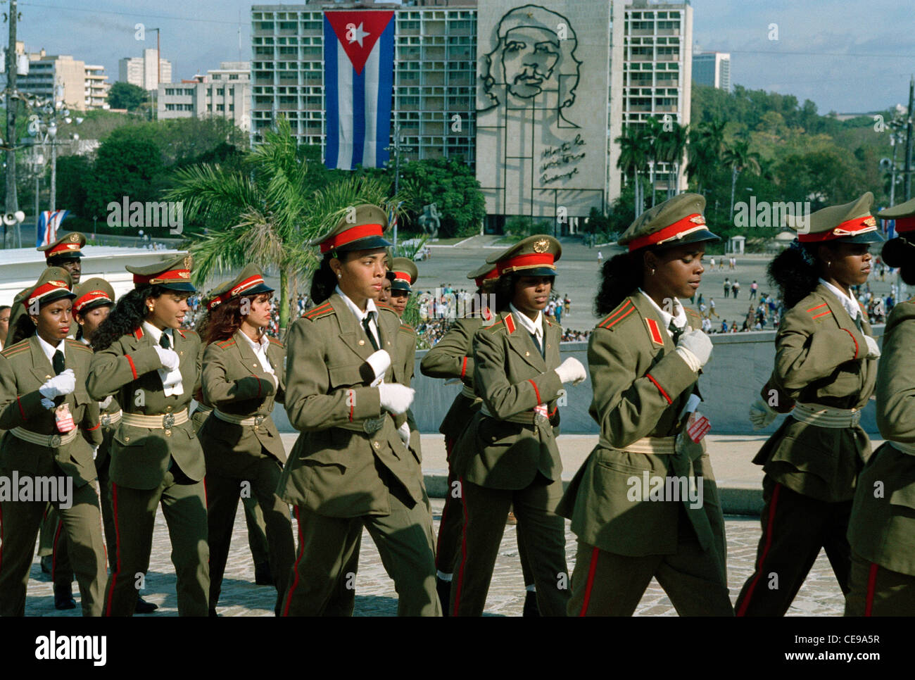 Cuban youth in military uniforms march during festivities on the ...