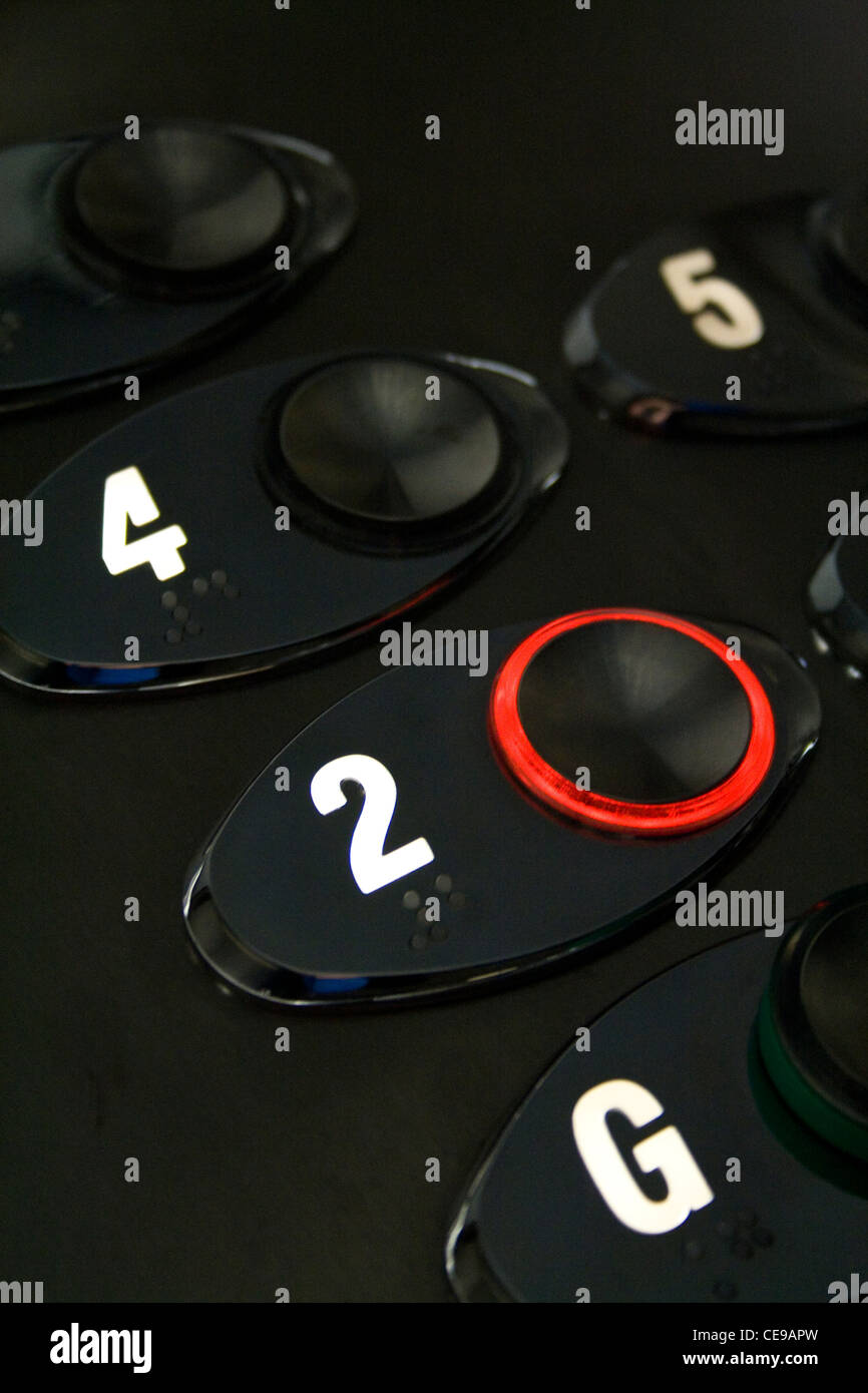 A key pad from inside a lift with the number 2 illuminated in red Stock ...