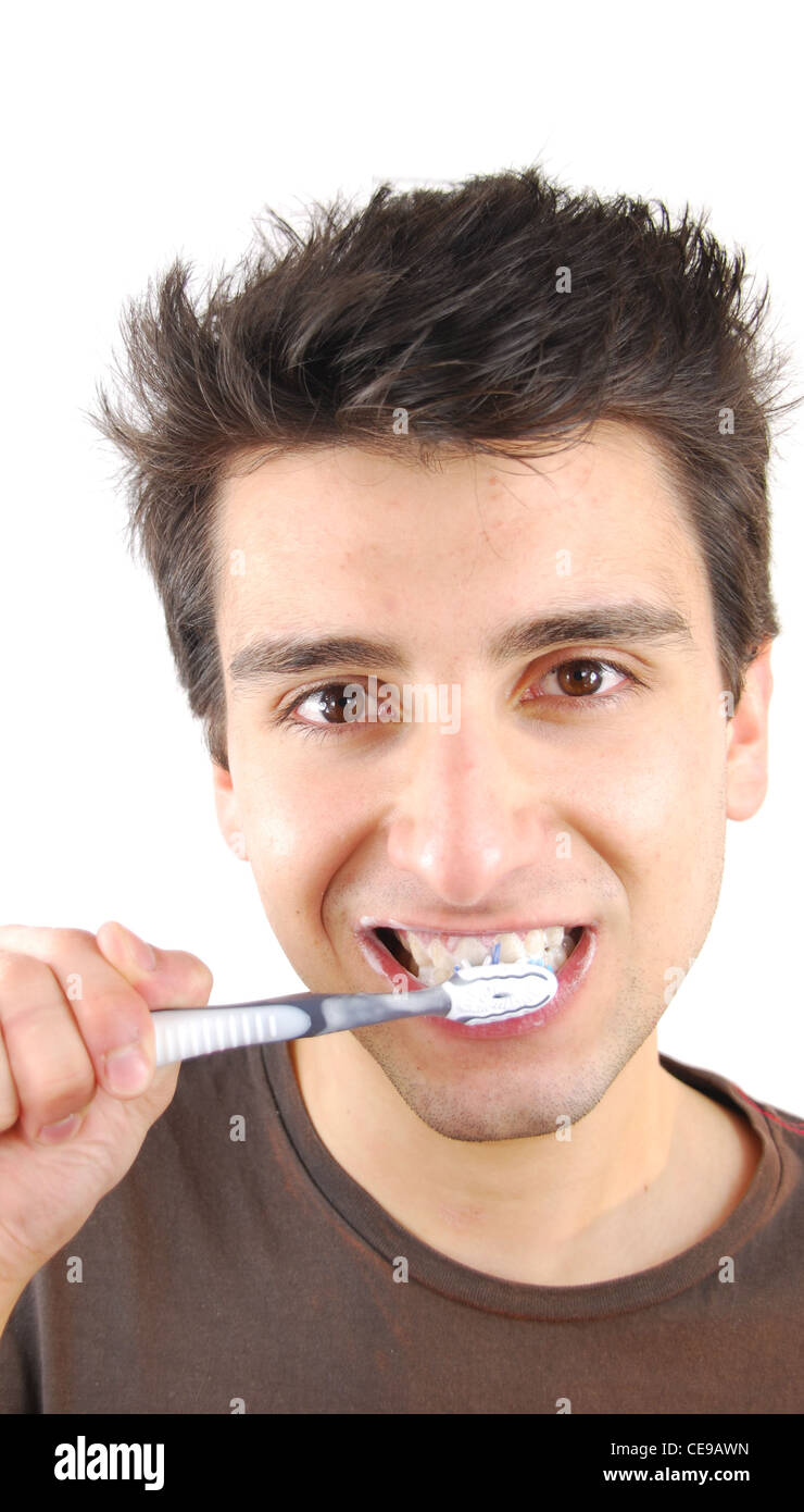 Cute guy washing his teeth Stock Photo - Alamy
