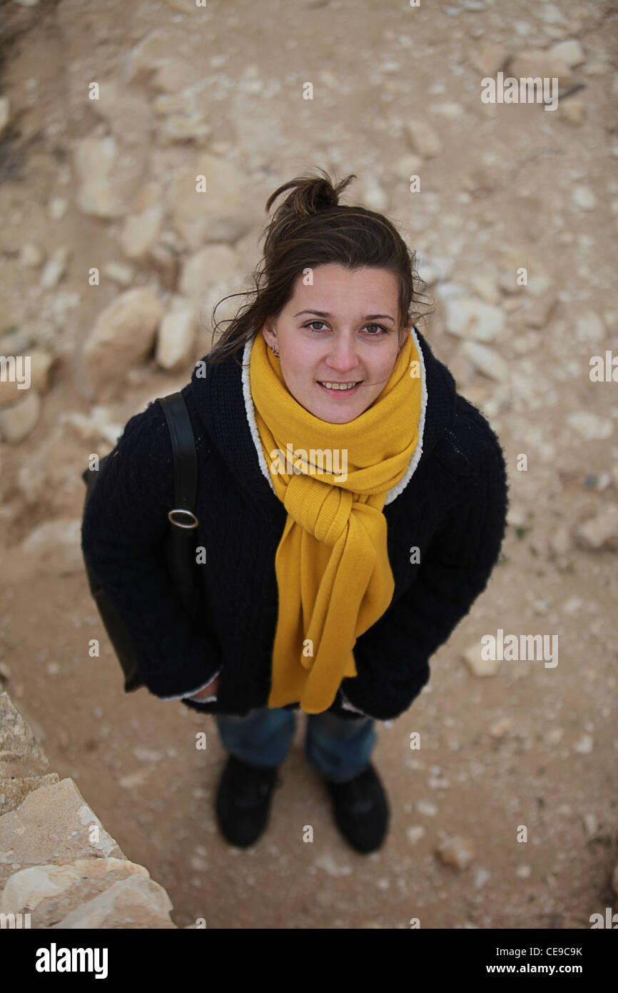 a pretty young girl looking up at the sky Stock Photo - Alamy