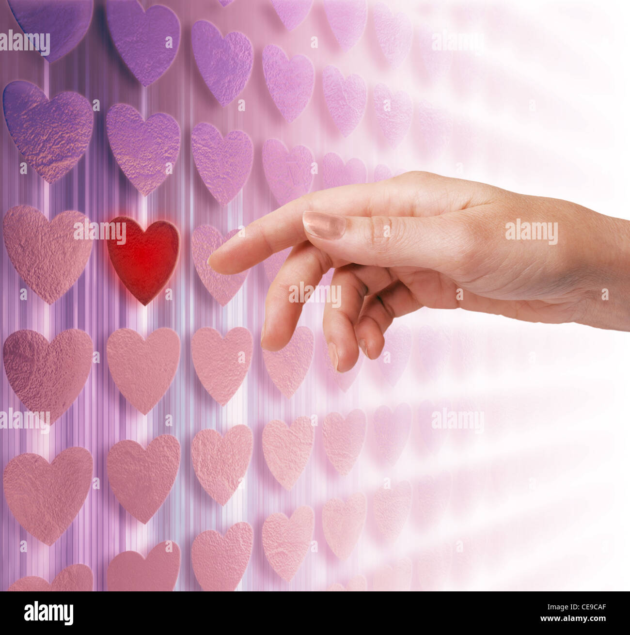 The woman chooses hot heart Stock Photo - Alamy