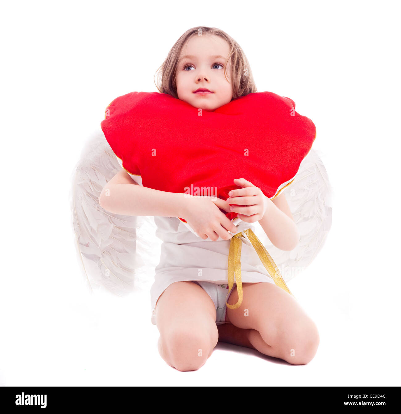 Cute Six Year Old Girl Dressed As A Cupid With A Red Heart Shaped