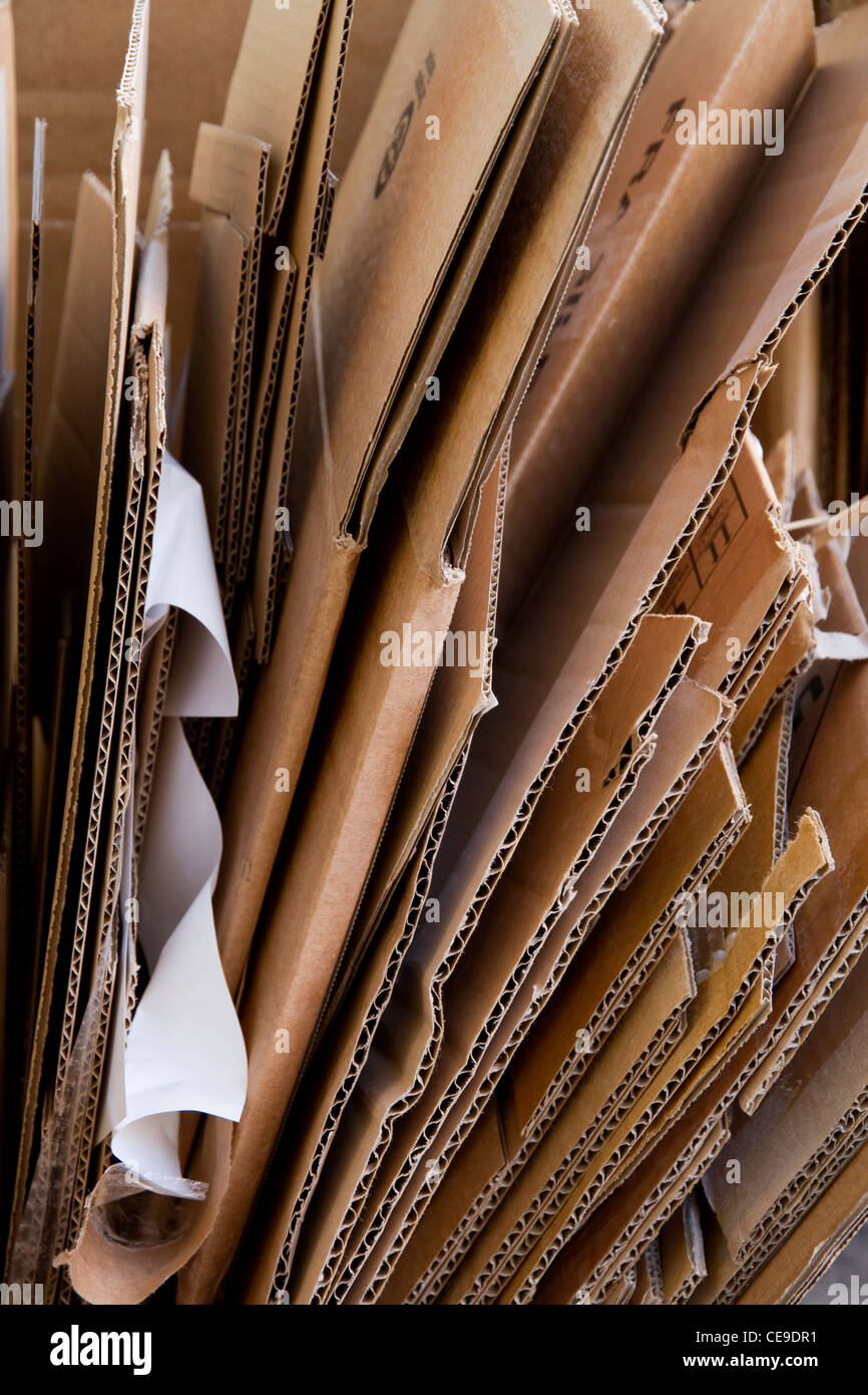 Cardboard for waste disposal set out on a street for collection in ...