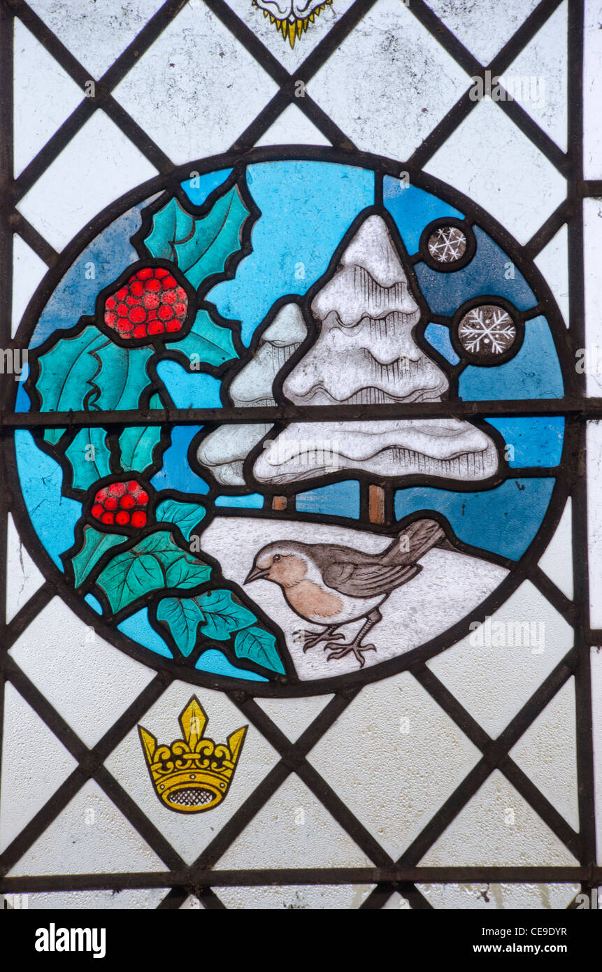 Stained glass window depicting the winter season, in the church of St ...