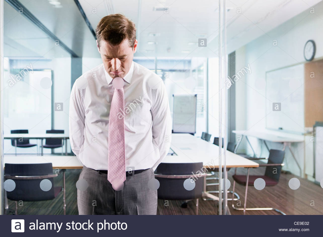 Dejected Man Looking Down Stock Photos & Dejected Man Looking Down ...